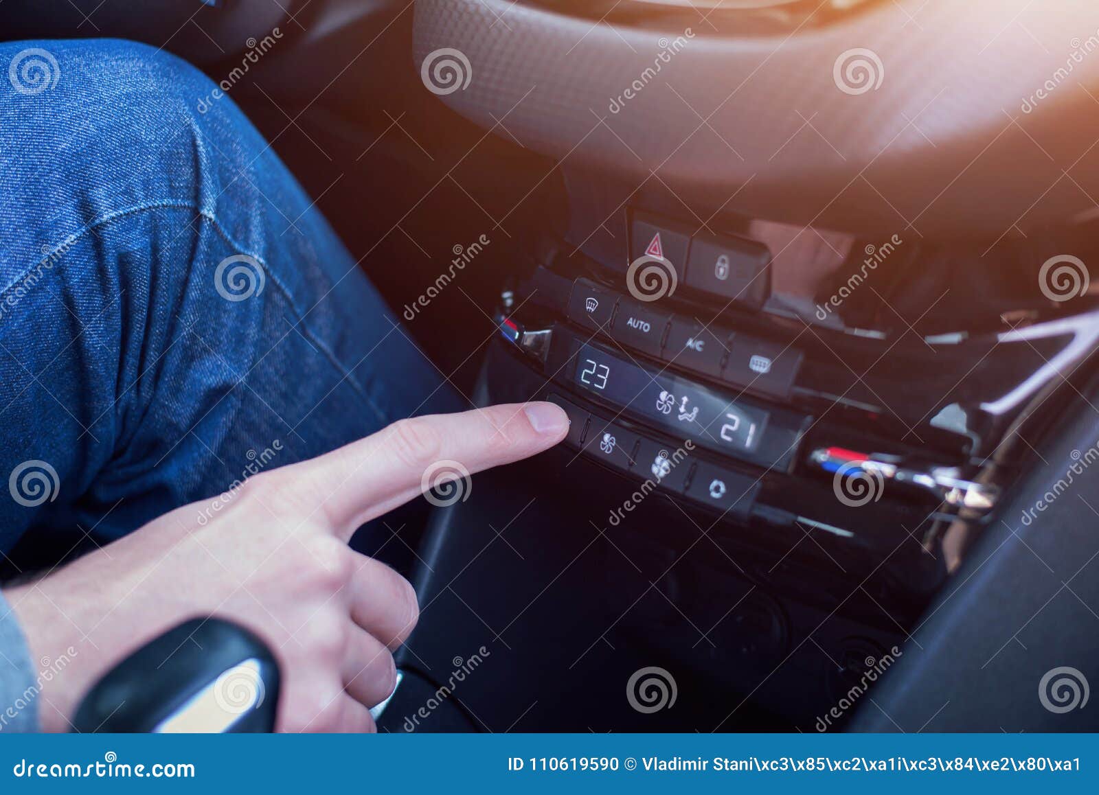 Changing the Temperature on the Air Conditioner in the Car Stock Photo ...