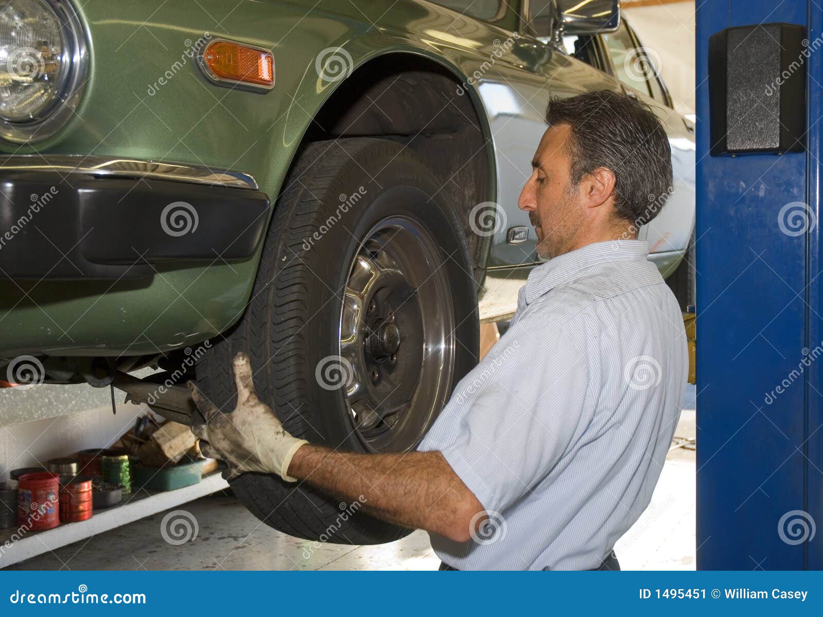 Changing a tire stock image. Image of name, house, happy - 1495451