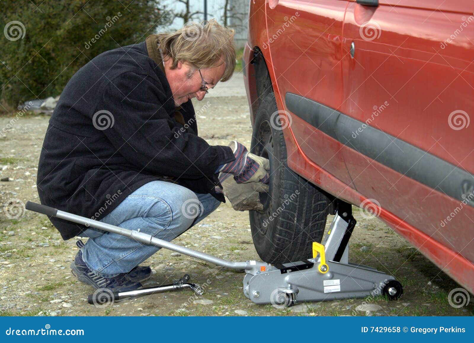 Changing Tire stock photo. Image of tire, upset, people - 7429658
