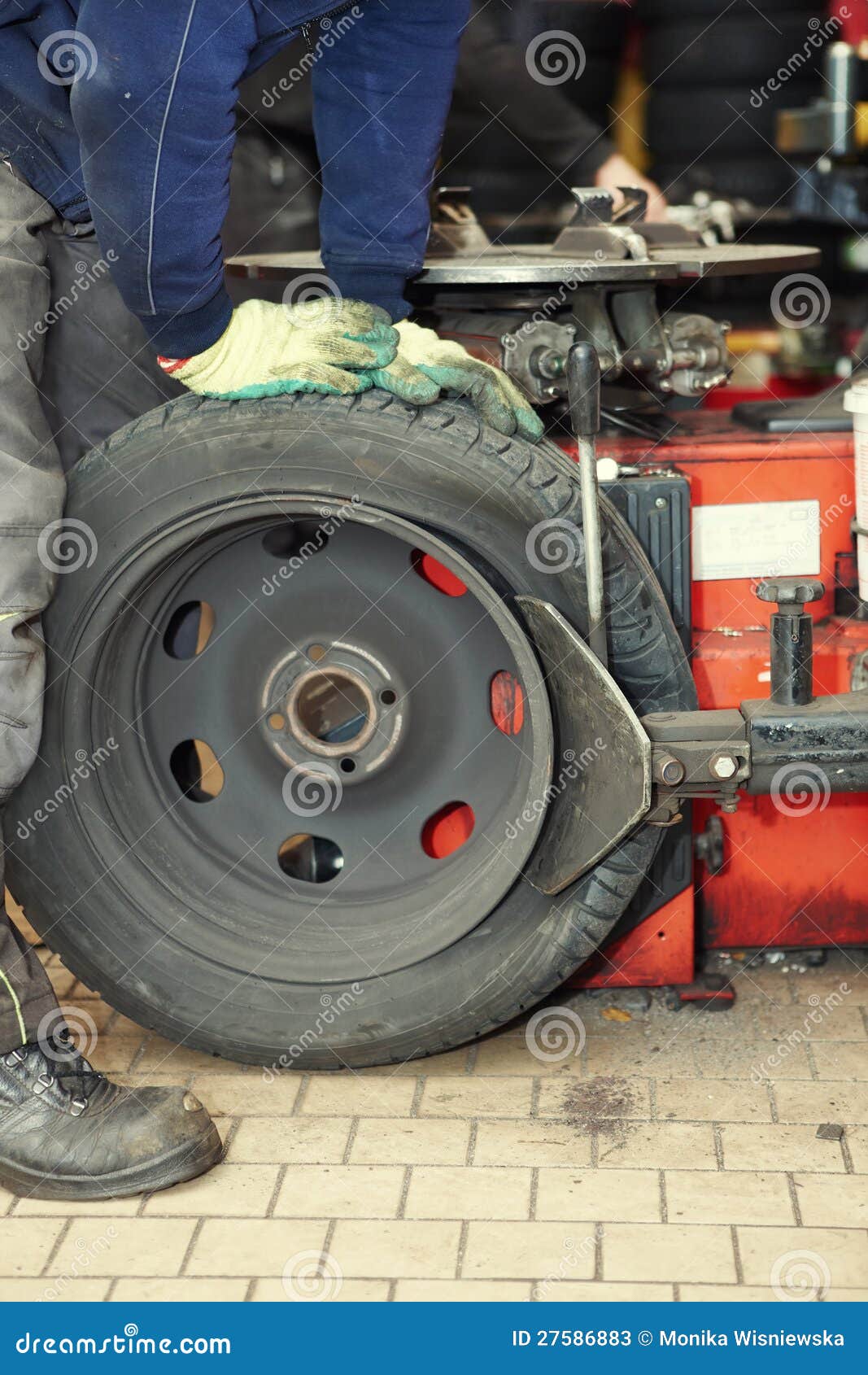 Changing a Tire in a Garage Stock Image - Image of machine ...