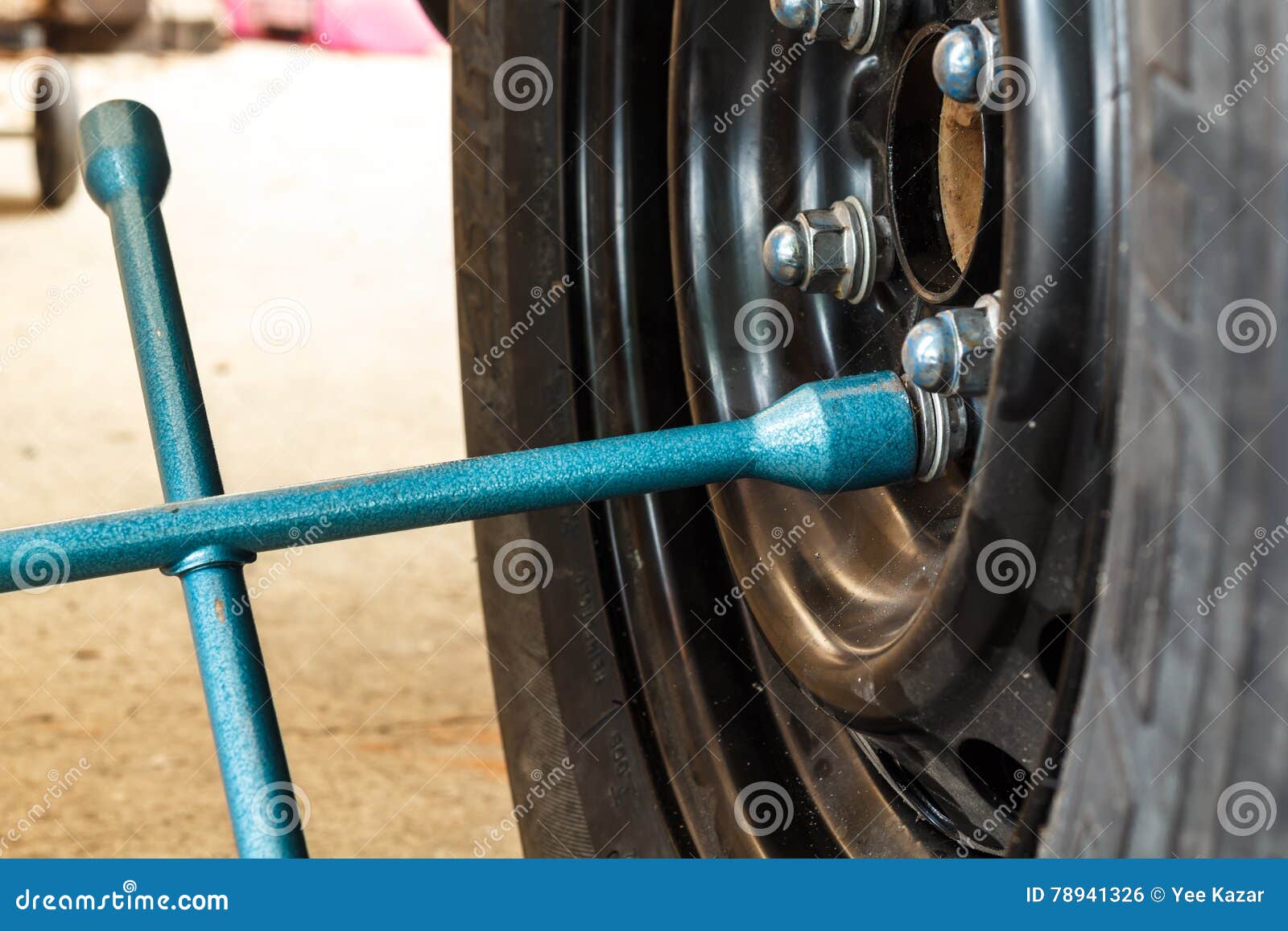 Changing Tire with Wheel Wrench. Stock Photo - Image of lookup ...