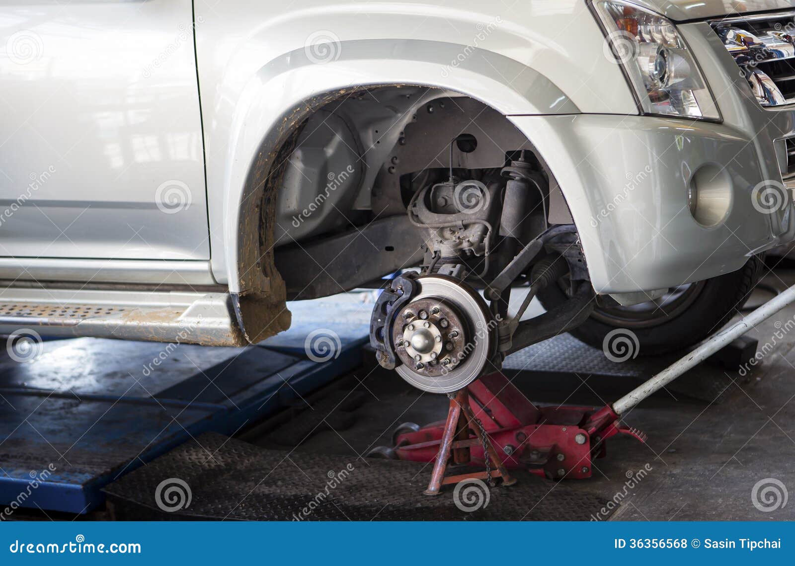 Changing wheel on a car stock photo. Image of male, transportation ...