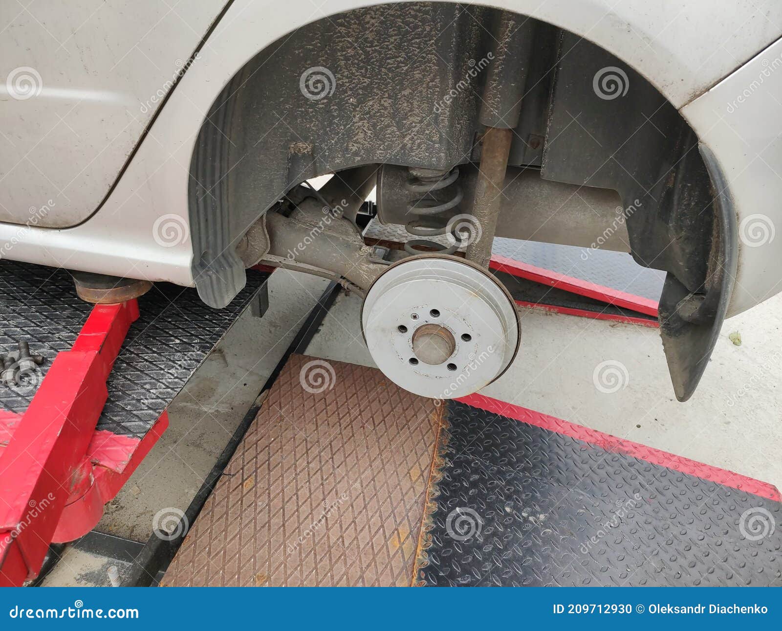 Changing Wheels in the Spring on a Passenger Car Stock Photo - Image of ...