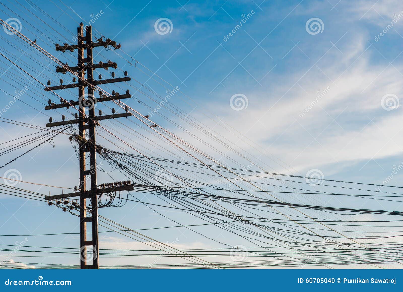 Chaotic Wire With Nest On Pole And Blue Sky Background Stock Photo ...