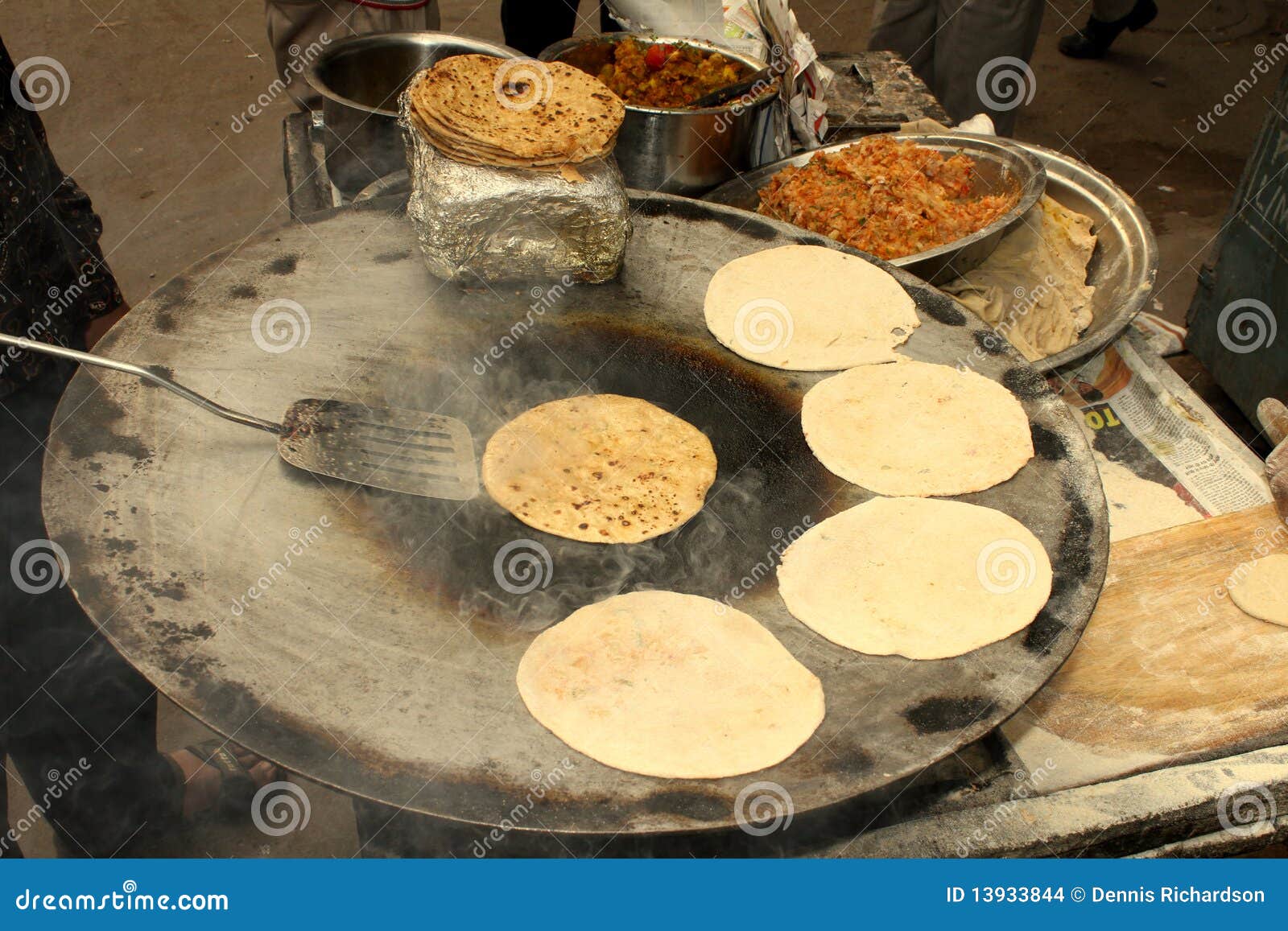 Chapati cooking stock photo. Image of chapati, cook, bread - 13933844