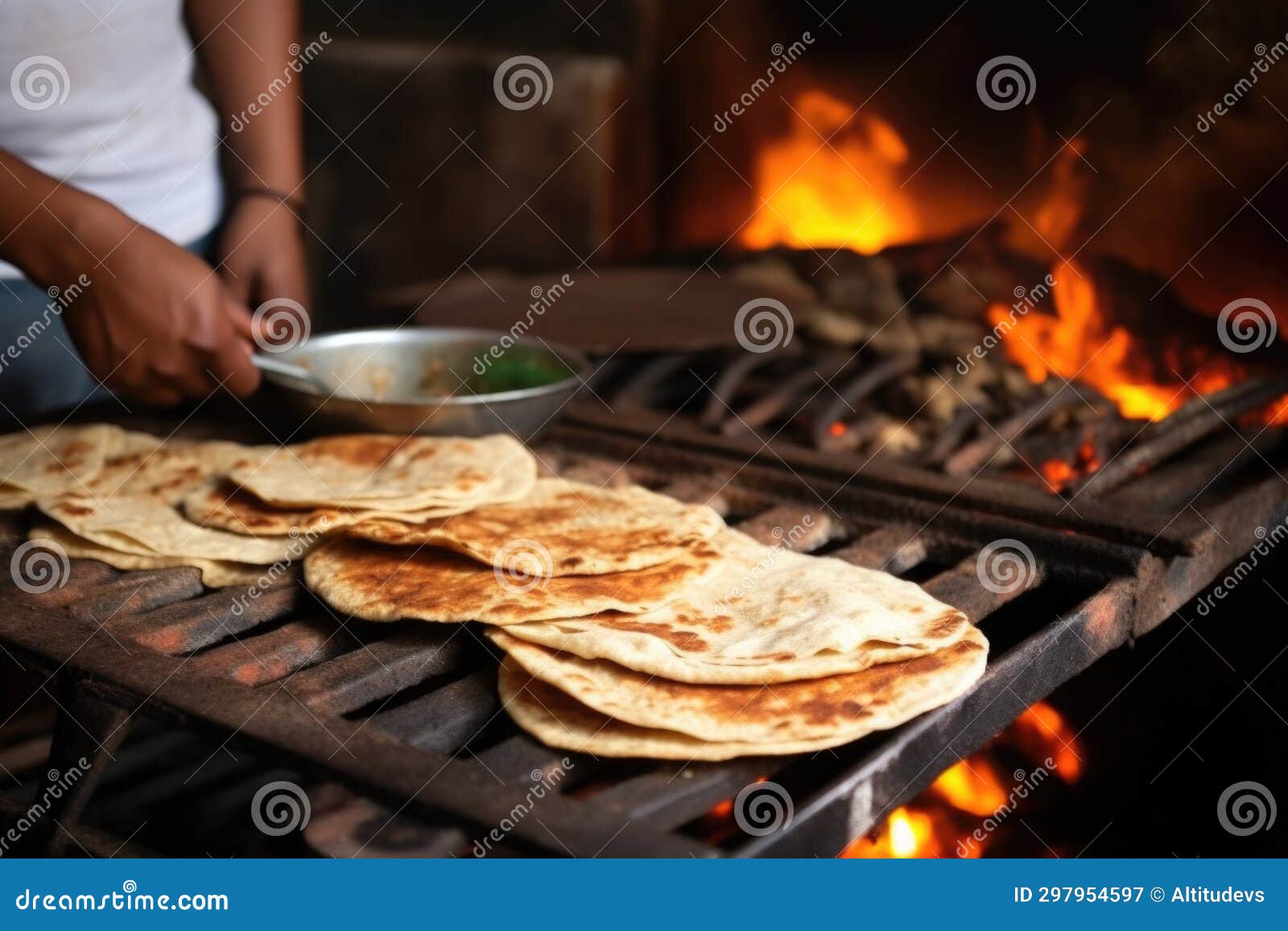 Chapatis Getting Roasted on a Griddle by Hand Stock Illustration ...
