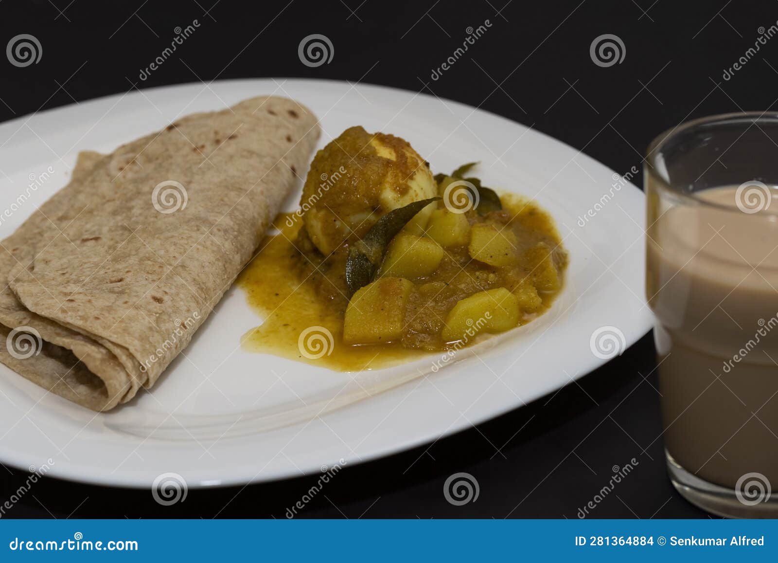 Chappathi and Egg Curry in Isolated Black Background Stock Photo ...