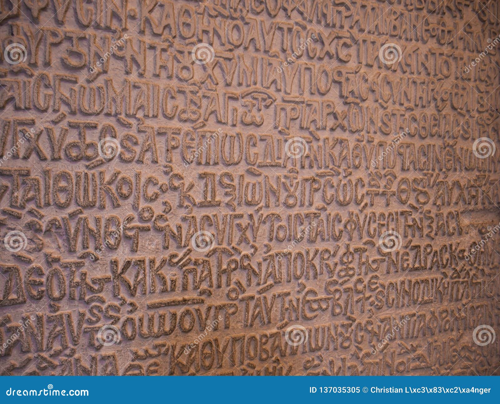 Character in Relief on a Stone Tablet Stock Image - Image of stonemason ...