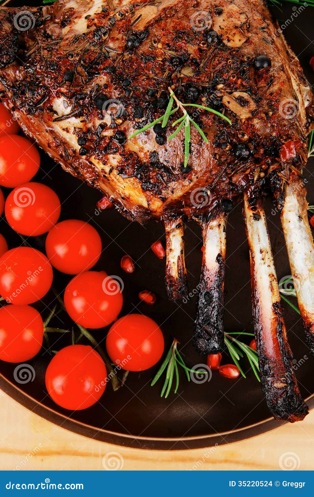 Charbroiled ribs on plate stock photo. Image of pomegranate - 35220524