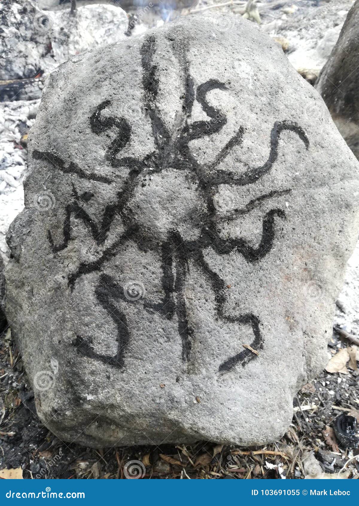 Painted sun on a rock stock image. Image of painted - 103691055