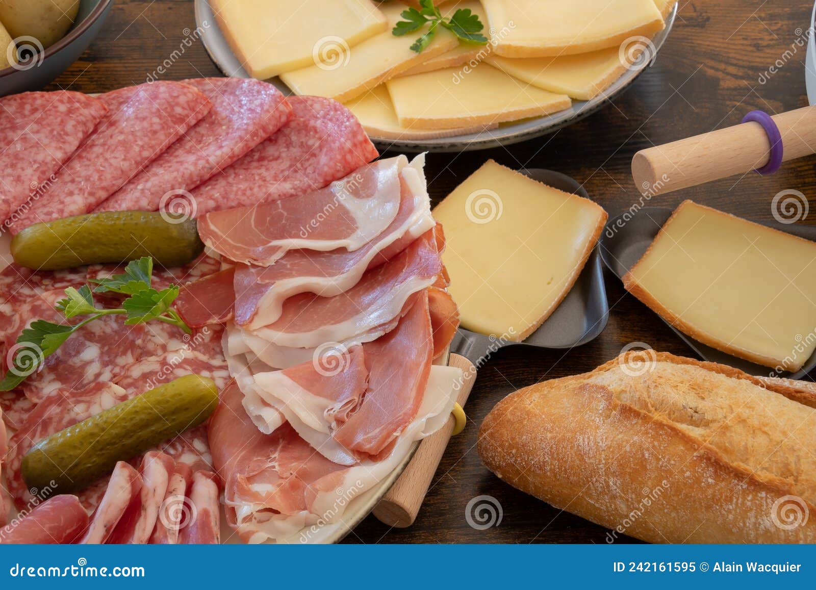 Charcuterie in a Dish with Raclette Cheese Stock Image - Image of ...