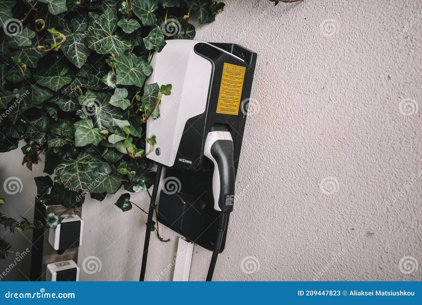 Charge Cable in the Charging Panel for an Electric Vehicle Stock Image ...