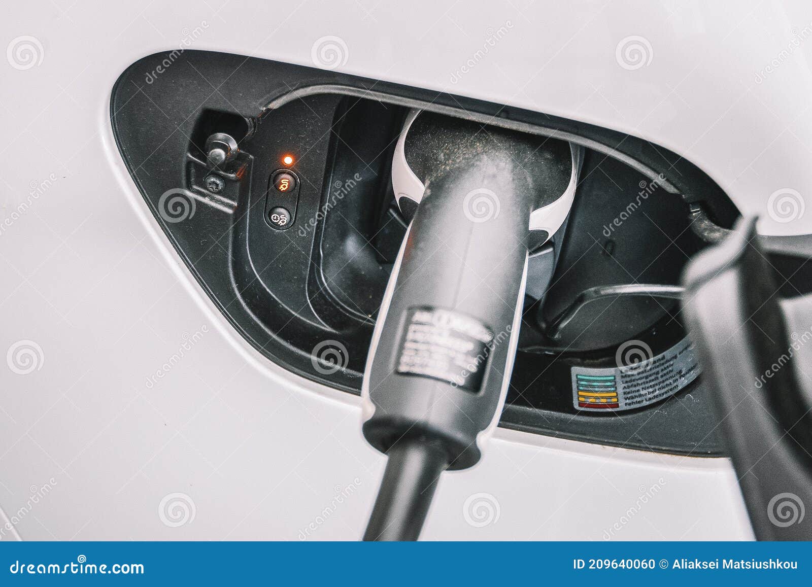 Charge Cable in the Charging Panel for an Electric Vehicle Stock Photo ...