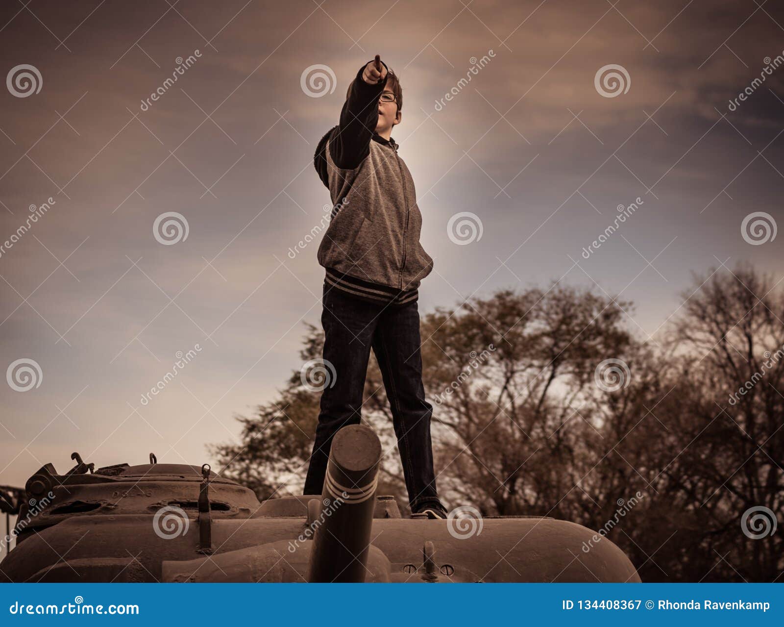Boy Standing on Top of Army Tank Stock Image - Image of outdoor, cannon ...