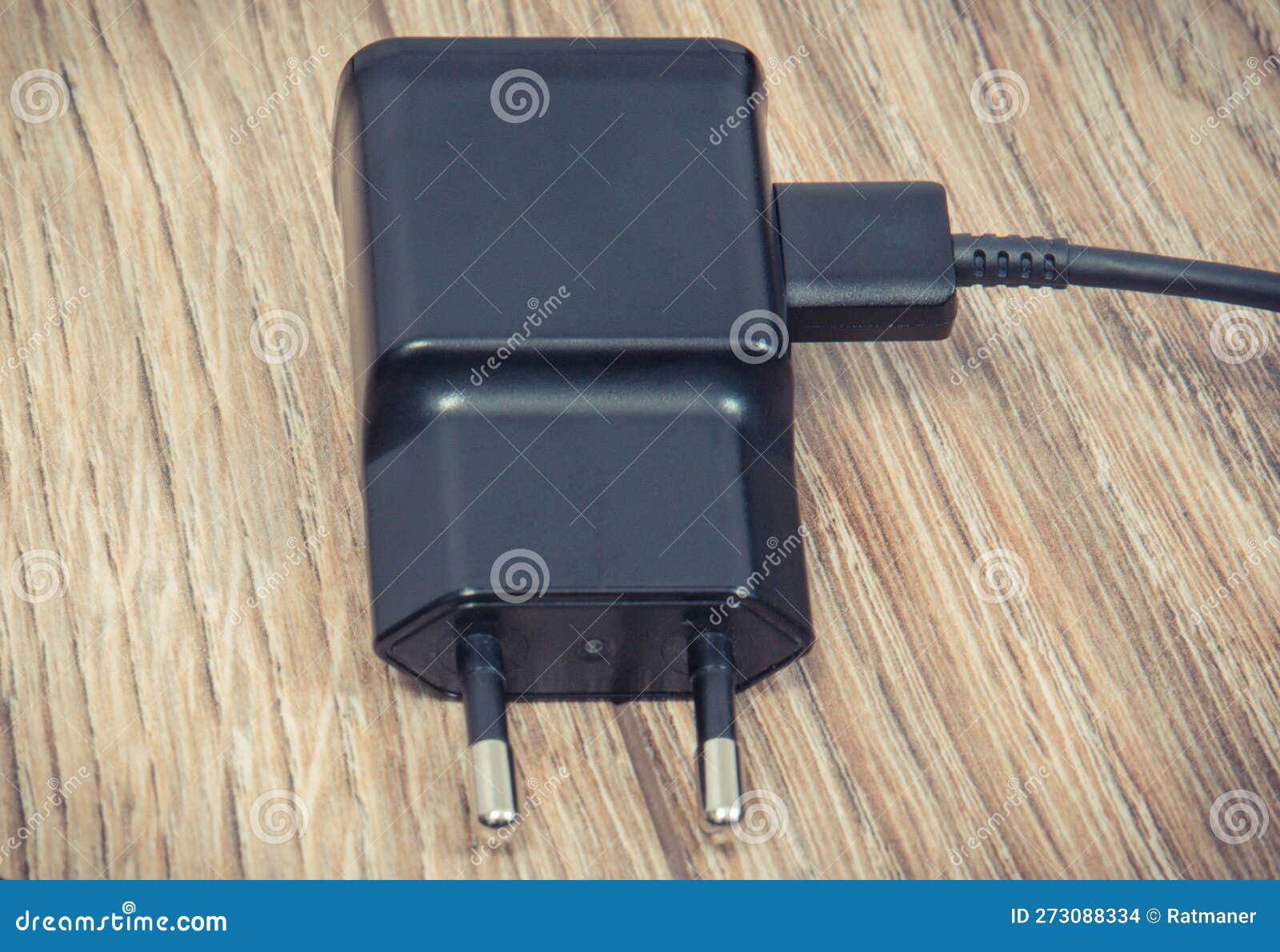 Charger Using To Charge Empty Battery of Smartphone. Various Devices ...