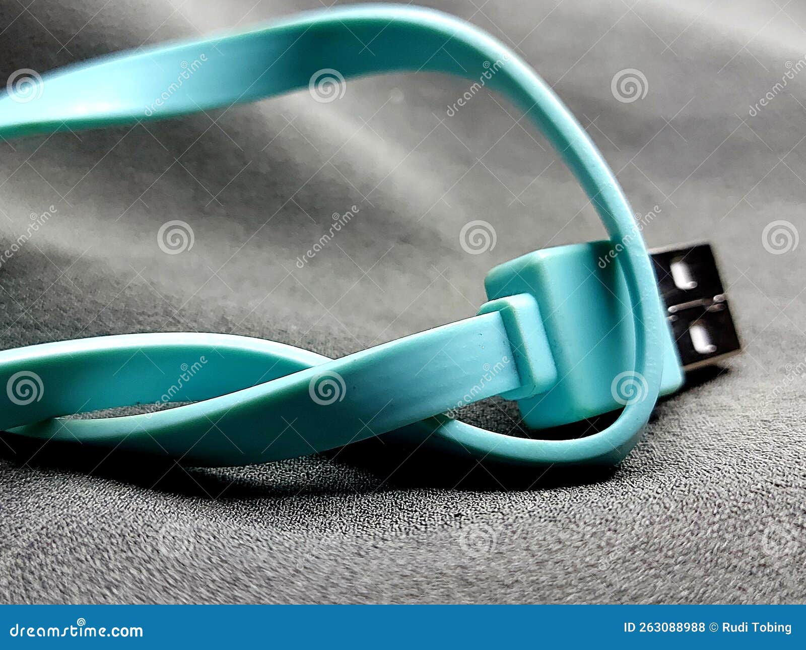 Charging Cable Which is Also a Data Cable As a Simple Object on a Gray ...