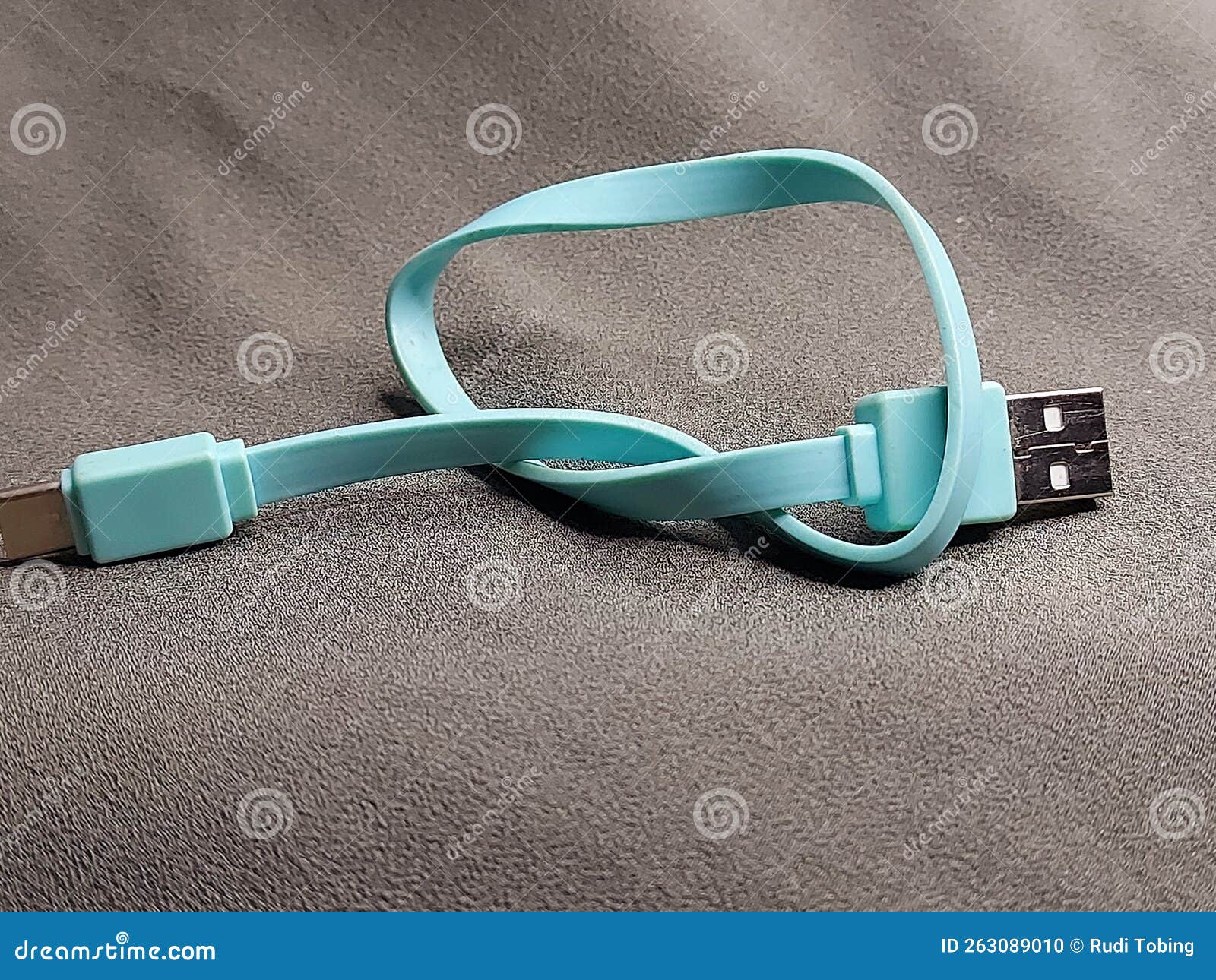 Charging Cable Which is Also a Data Cable As a Simple Object on a Gray ...