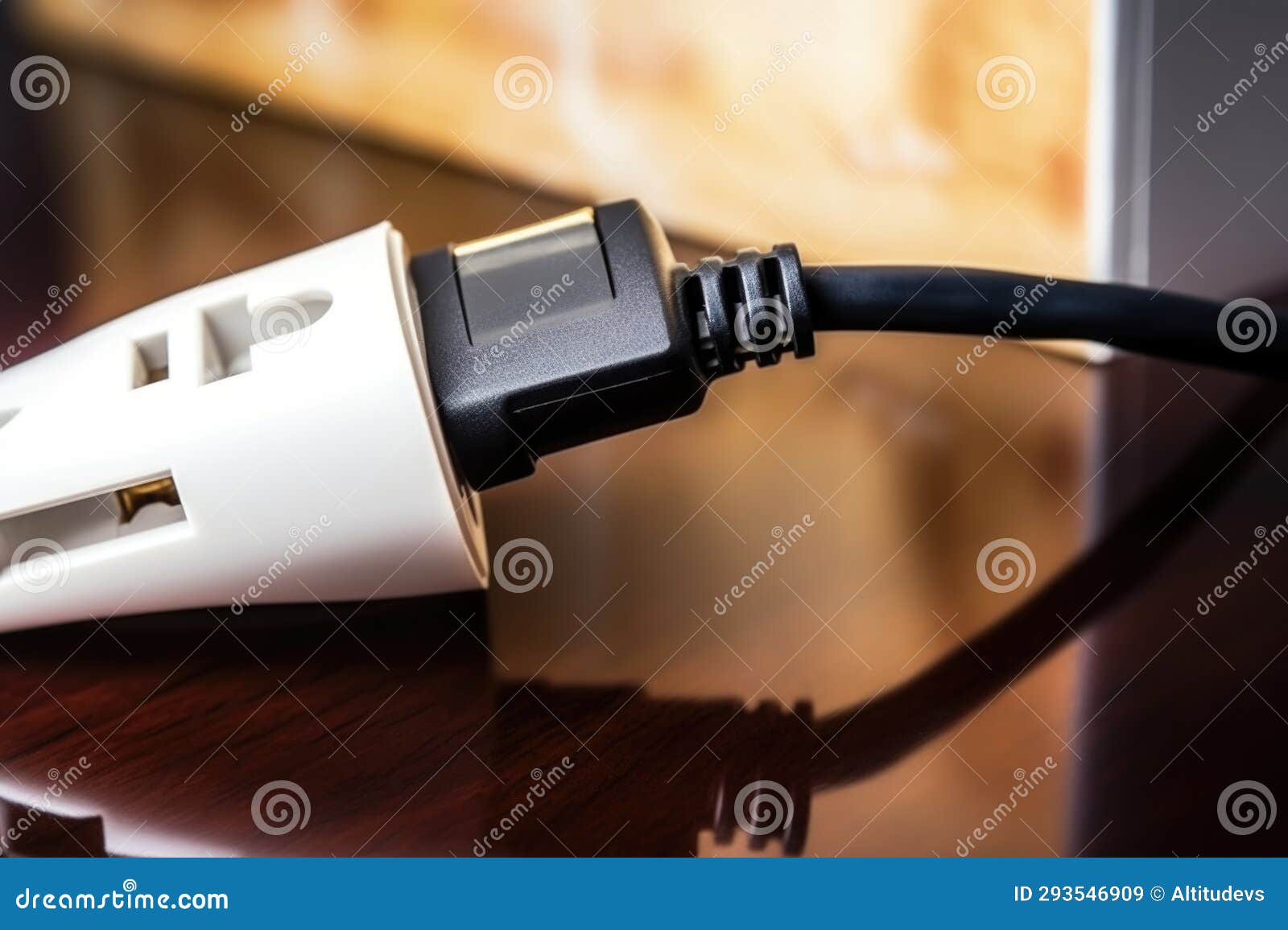 Plugged Into The Electrical Socket And Microphone Jack On The Floor ...