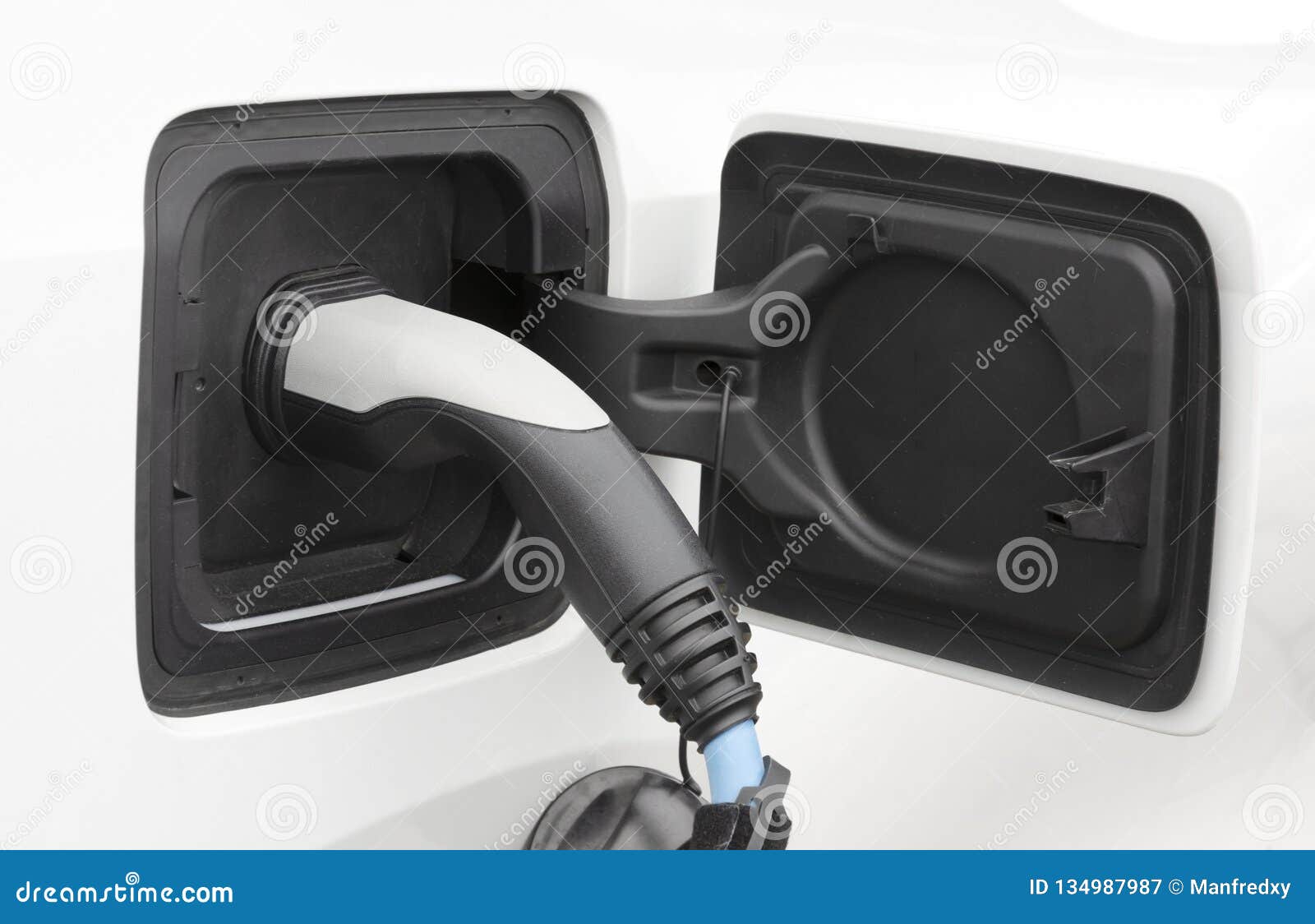 Charging an electric car stock image. Image of environmentally - 134987987