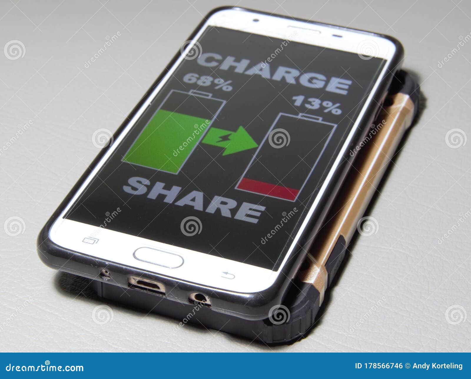 Charging a Mobile Cell Phone with Charge Share Stock Photo - Image of ...