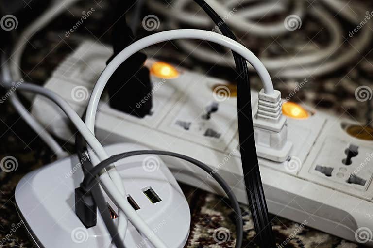 Charging Multiple Electronic Devices on a Power Plug Stock Image ...