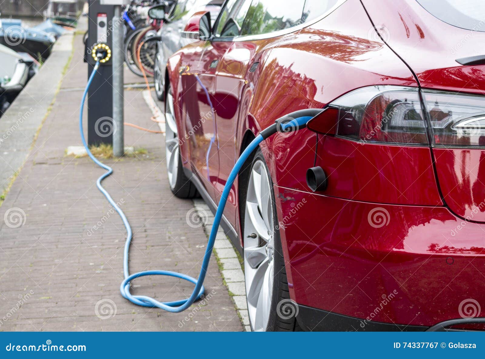 Charging a Red Electric Car Stock Image - Image of environmental, cable ...