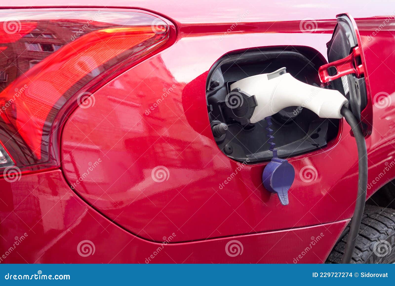 Charging Red Plug-in Hybrid Car Stock Photo - Image of power, driving ...