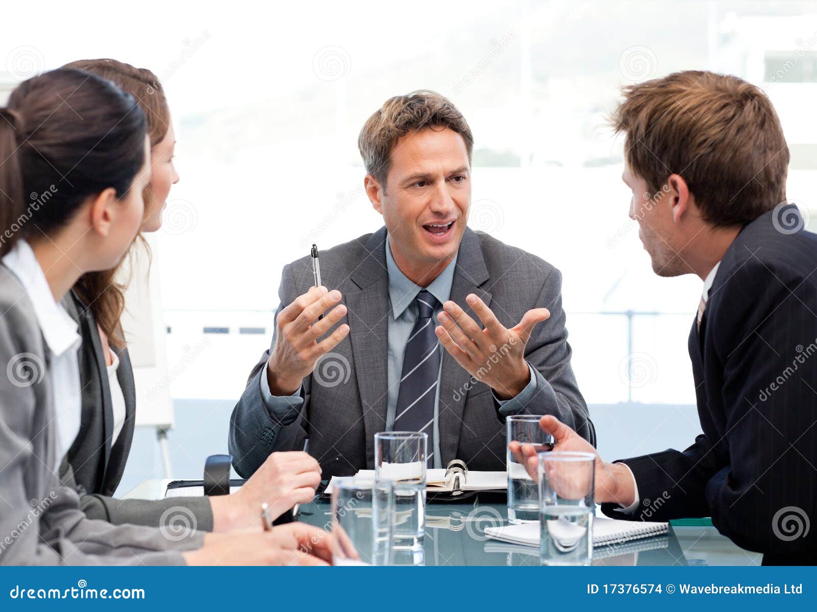 Charismatic Chairman Talking with His Team Stock Photo - Image of ...