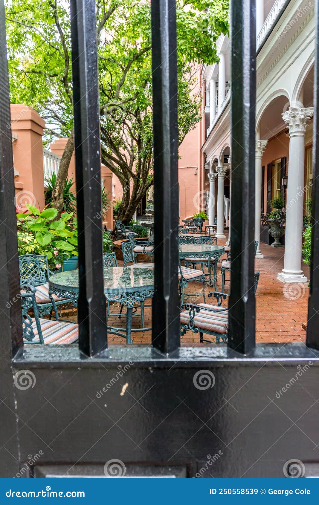 Charleston Courtyard Scene stock image. Image of south - 250558539