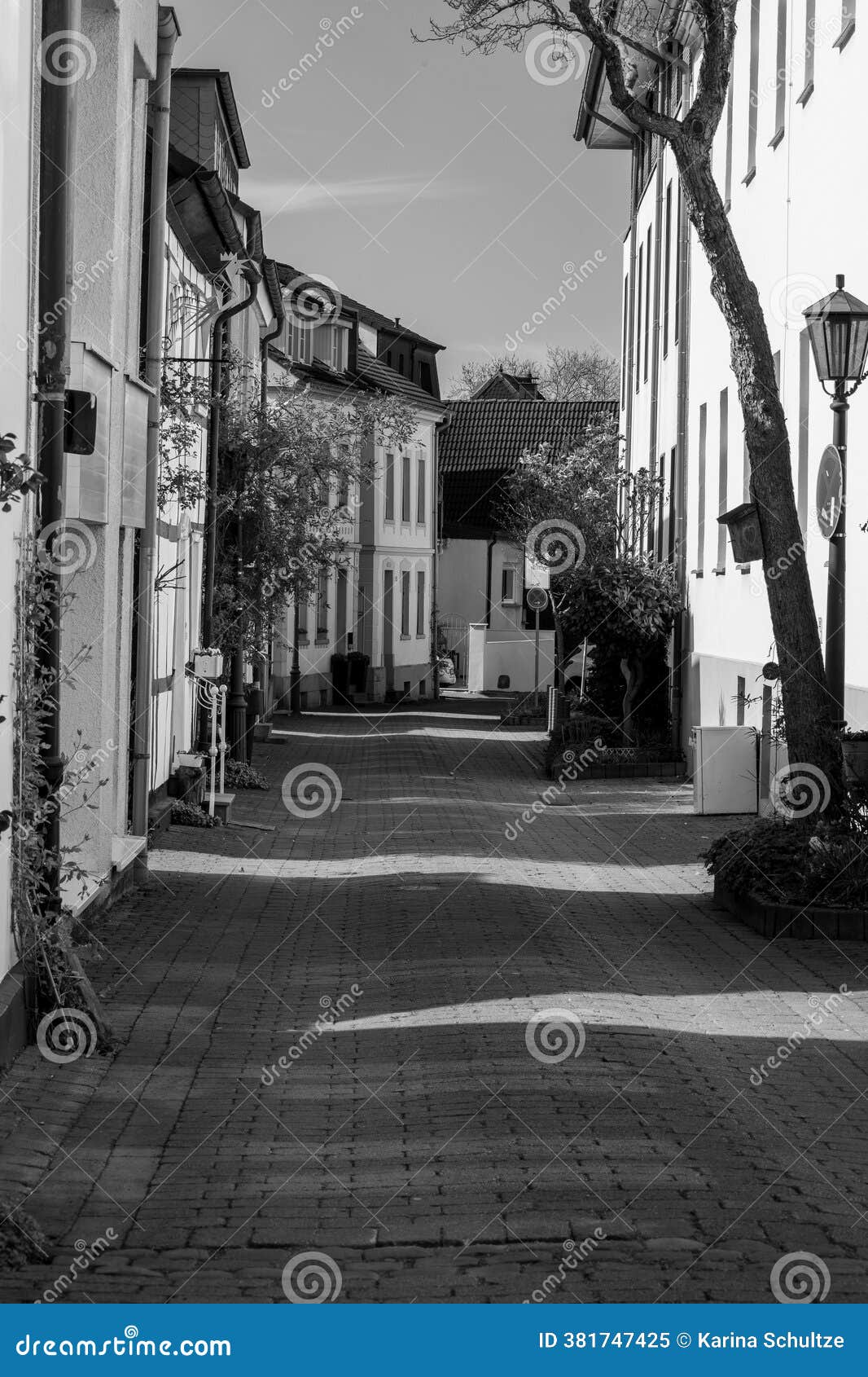 Charming Alley In Alberobello, Italy Featuring Traditional White Trulli ...