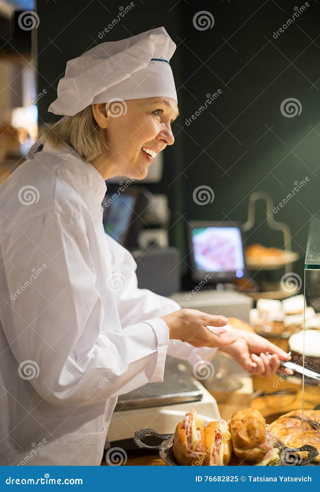 Charming Bakery Staff Sells Bread and Different Pastry for Sale Stock ...
