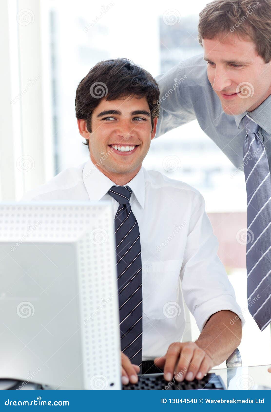 Charming Businessman Working at a Computer Stock Photo - Image of ...