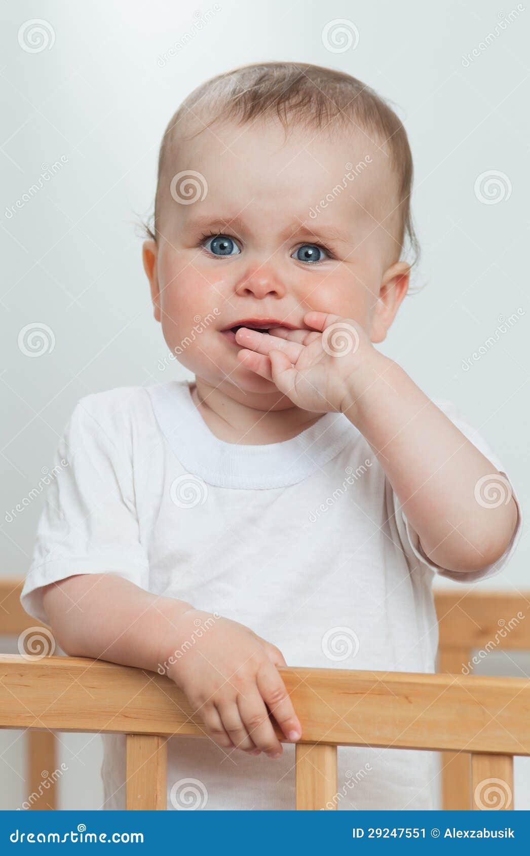 Charming child in the crib stock image. Image of home - 29247551