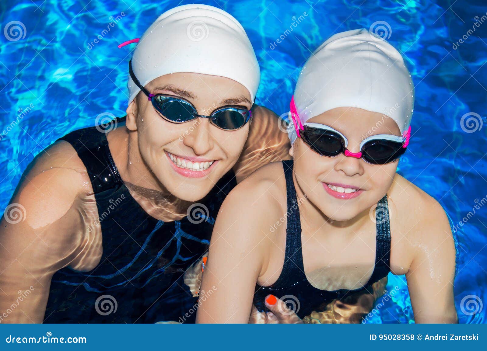 Charming Coach with His Student Swimming in the Pool Stock Photo ...