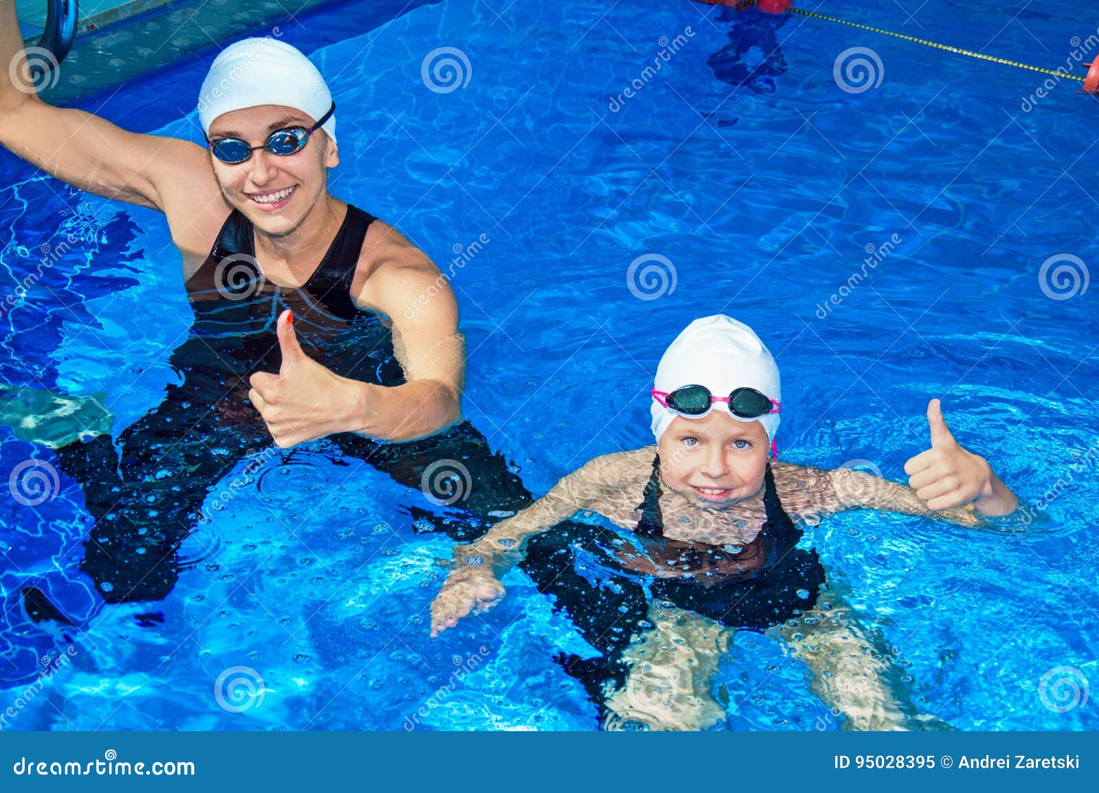 Charming Coach with His Student Swimming in the Pool Stock Image ...