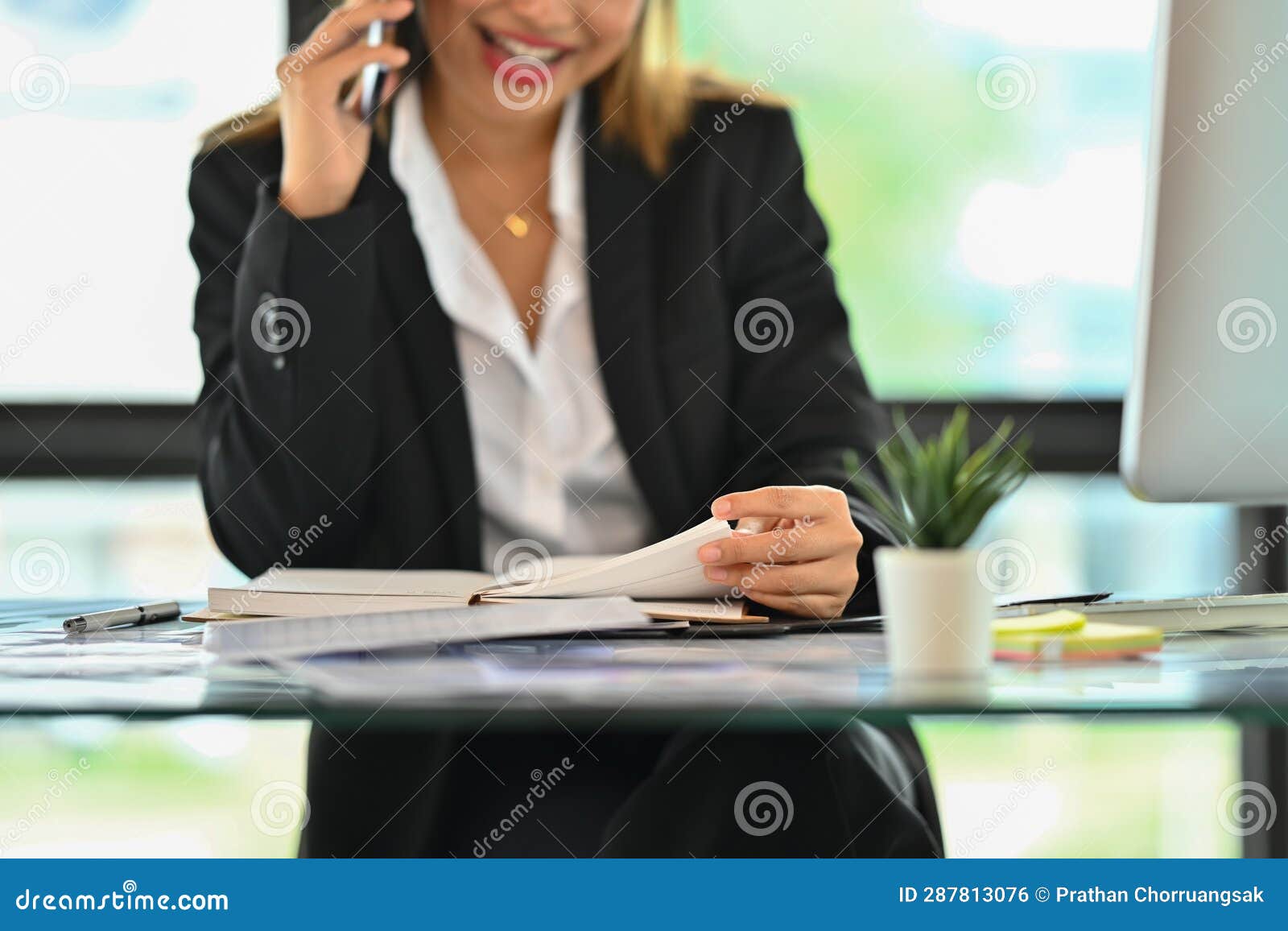 Charming Female Advisor Looking Information on Digital Tablet and ...