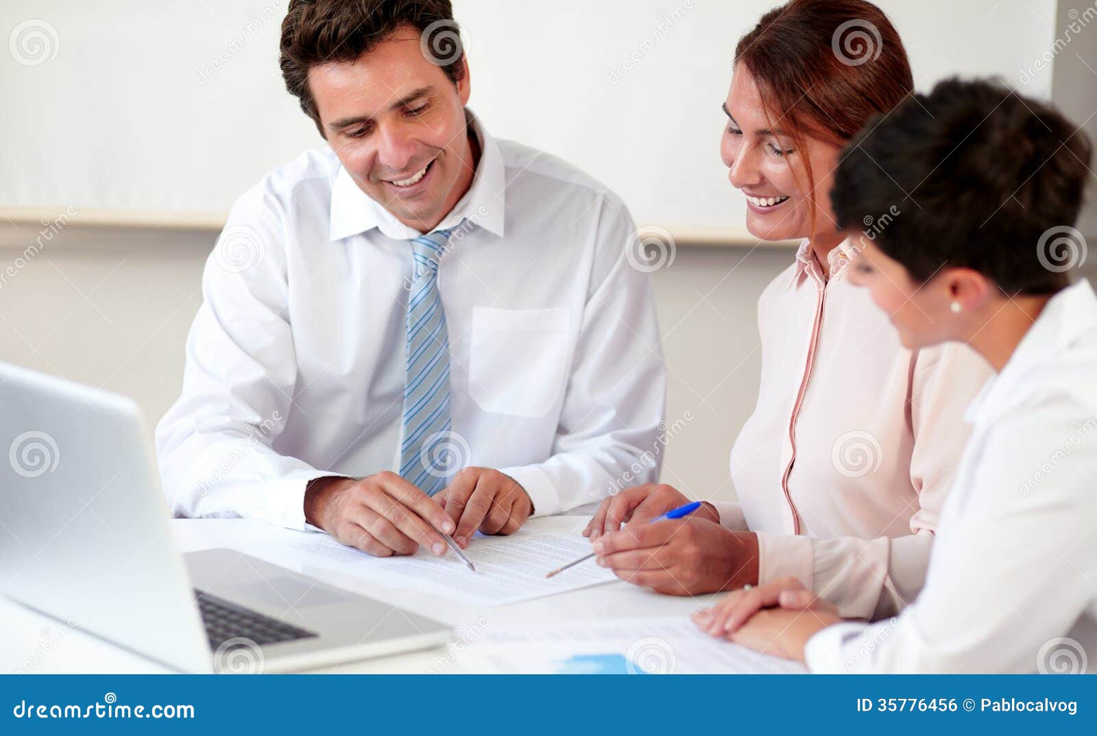 Charming Hispanic Colleagues Working on Documents Stock Photo - Image ...