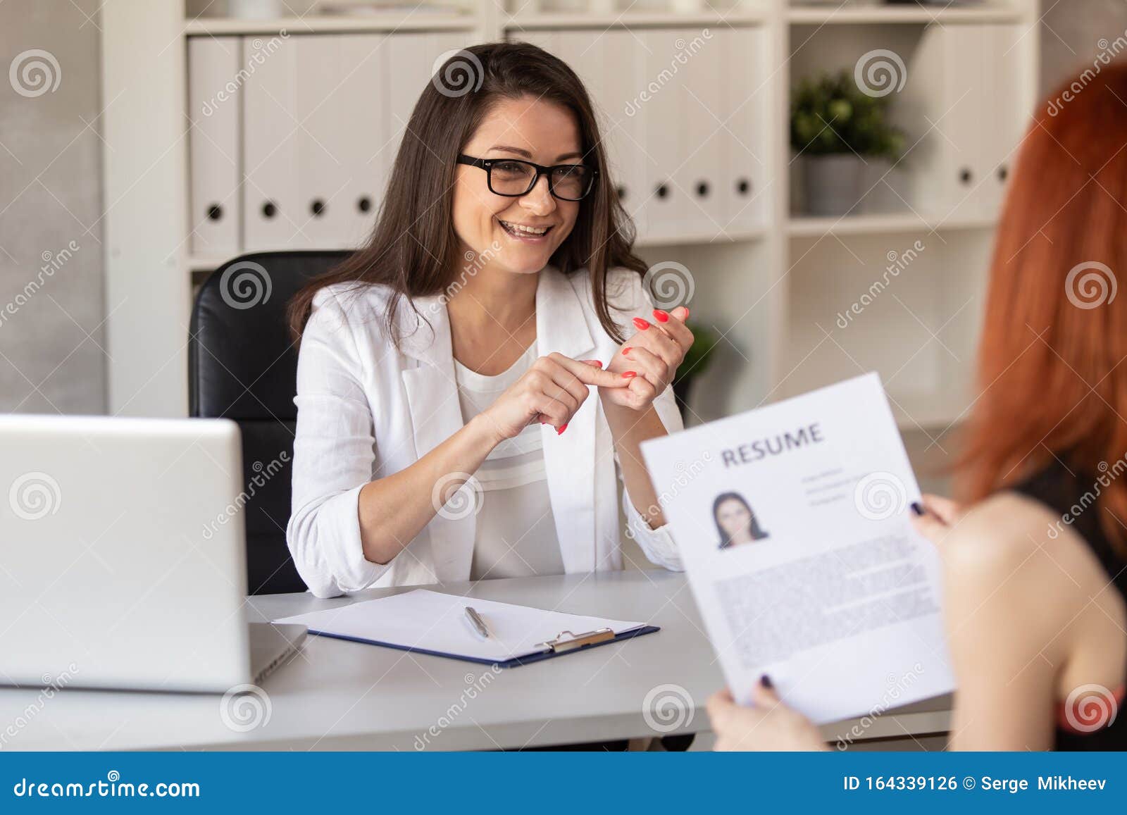 Charming HR Manager in Friendly Manner Leads a Job Interview with One ...