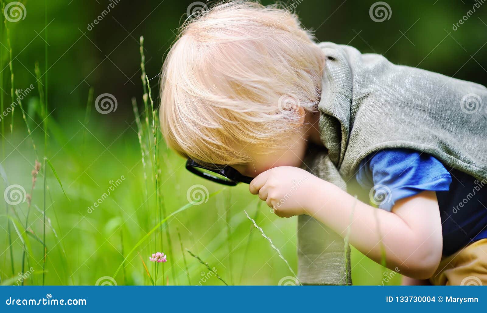 Charming Kid Exploring Nature with Magnifying Glass Stock Photo - Image ... Charming Kid Exploring Nature with Magnifying Glass Stock Photo - Image ...