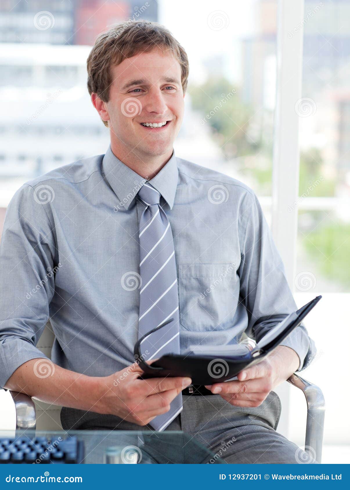 Charming Male Executive Looking at His Agenda Stock Image - Image of ...