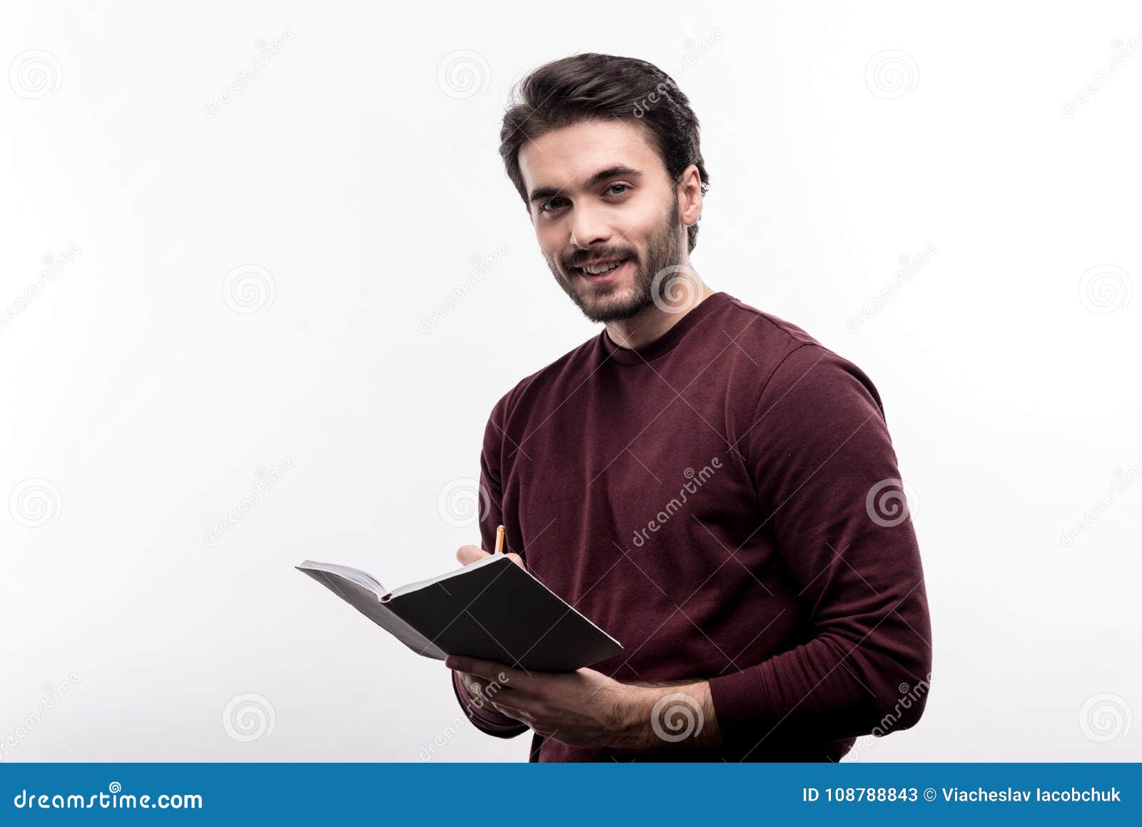 Charming Man Posing while Taking Notes Stock Image - Image of ...