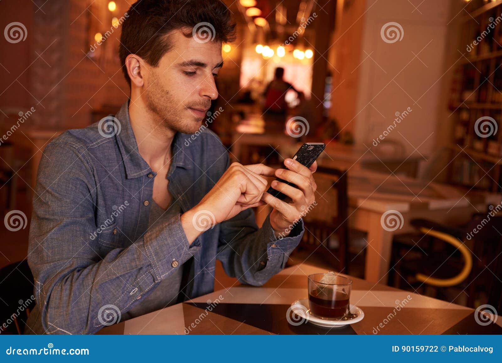 Charming Millenial Texting in a Restaurant Stock Photo - Image of focus ...