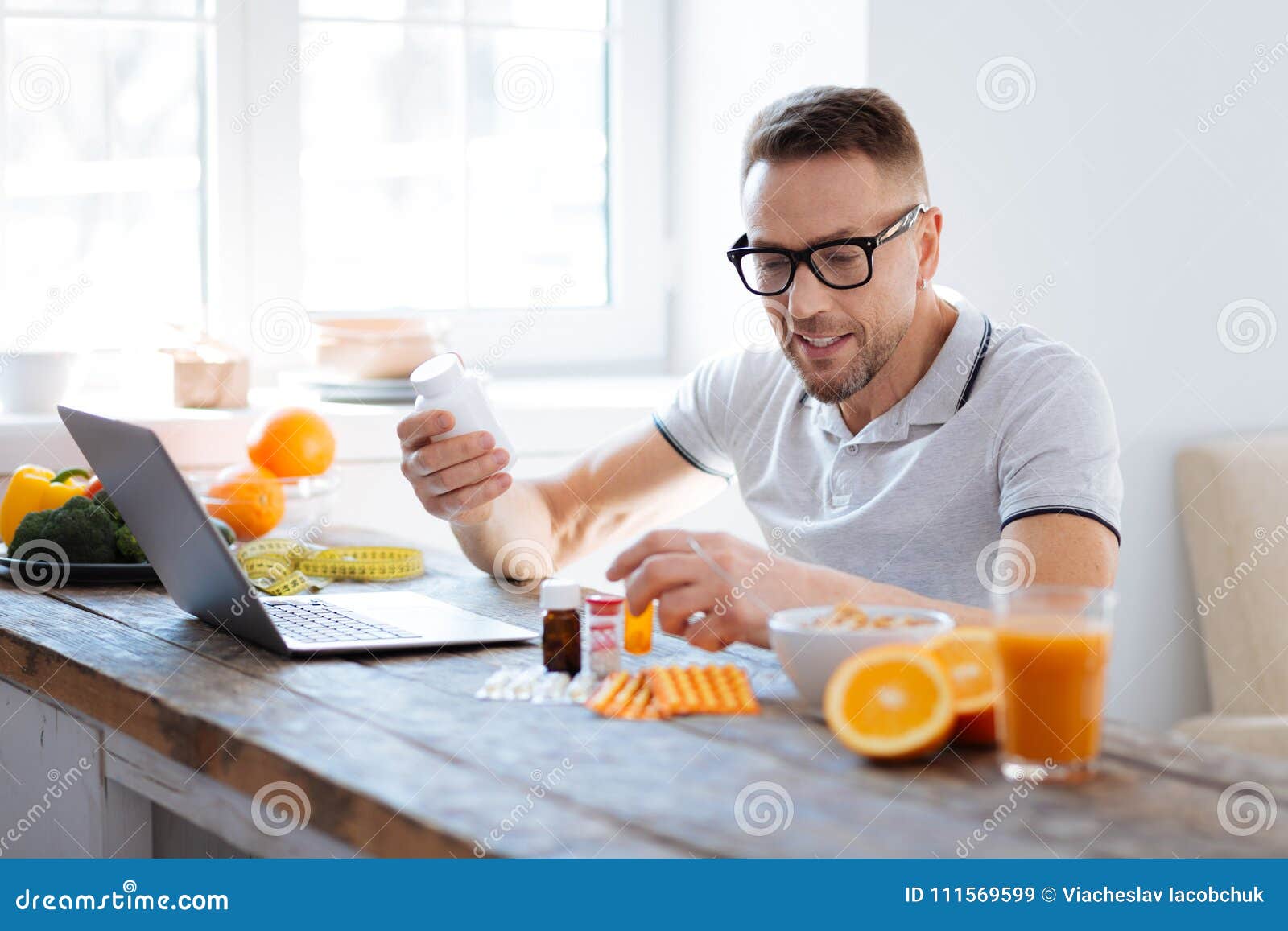 Charming Musing Man Studying Biohacking Supplements Stock Image - Image ...
