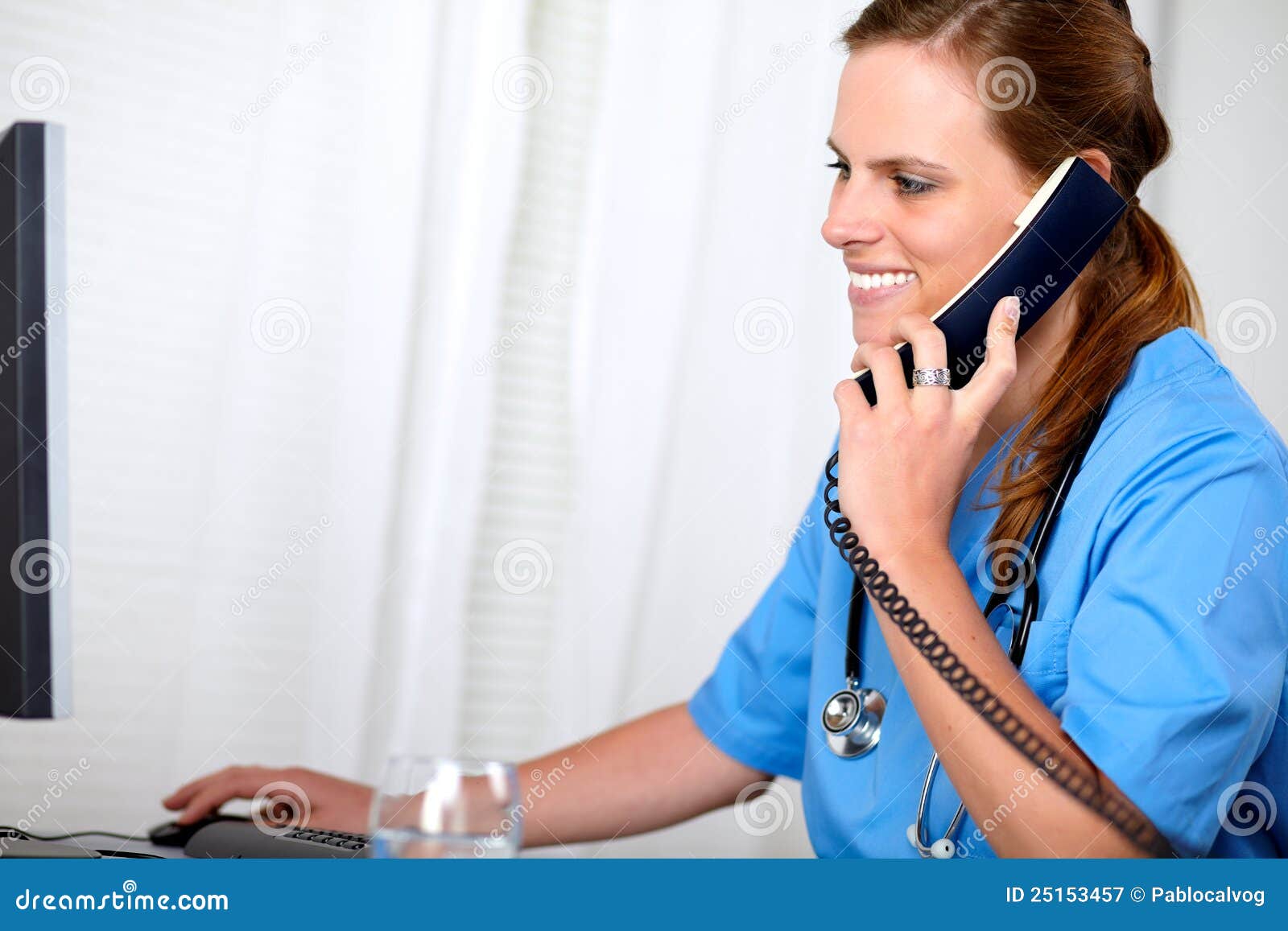 Charming Pretty Nurse Looking on Computer Stock Image - Image of ...