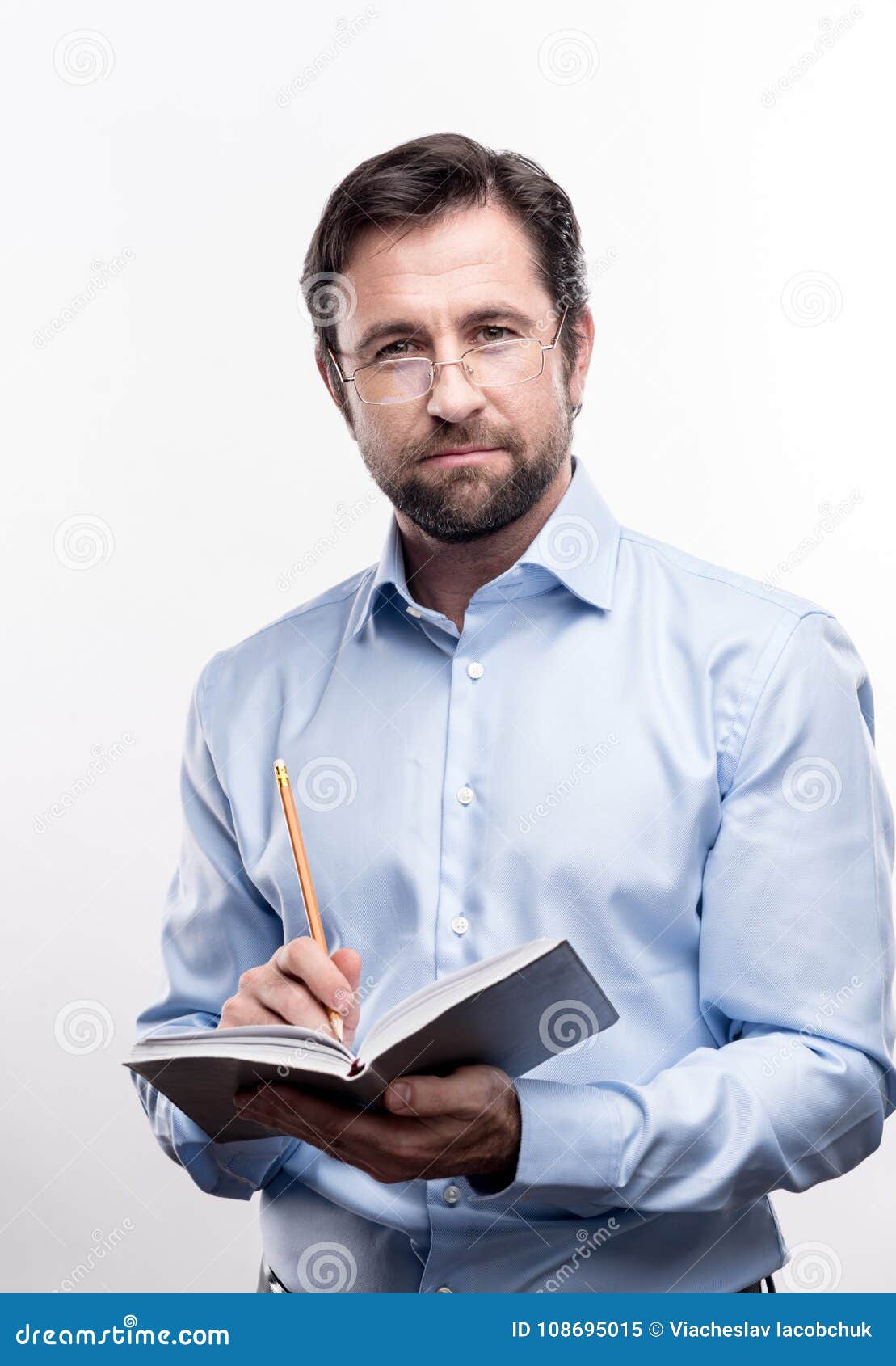 Charming Professor Taking Notes in His Notebook Stock Image - Image of ...
