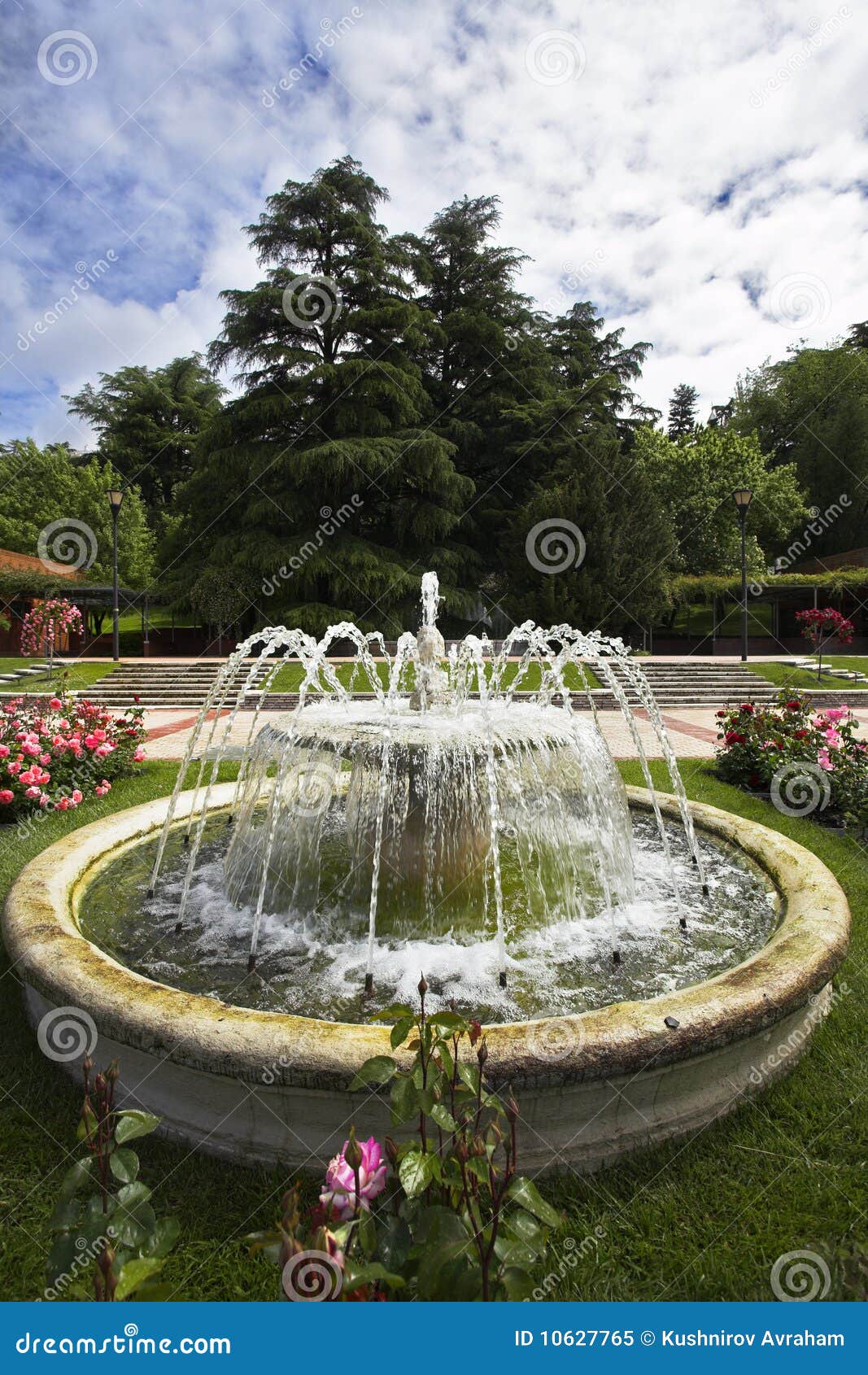 Charming Round Fountain in a Garden of Roses Stock Image - Image of ...
