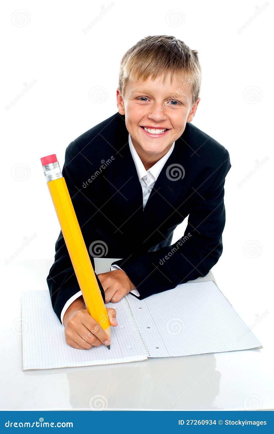 Charming School Boy Writing His Assignment Stock Photo - Image of ...