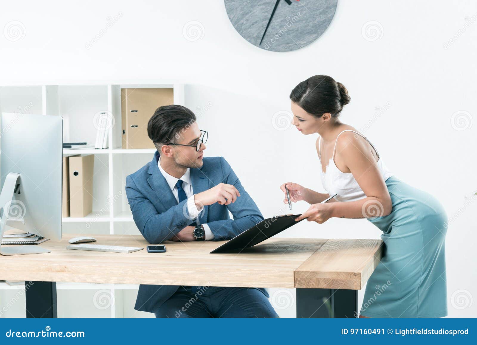 Charming Secretary Talking To Her Boss at Office Stock Image - Image of ...