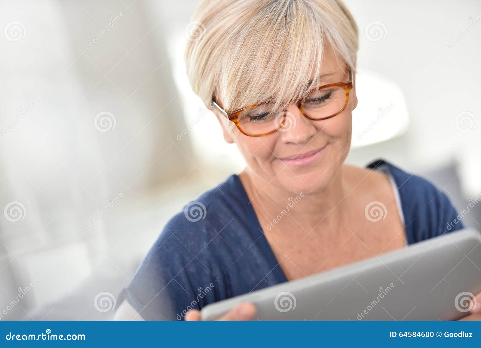 Charming Senior Lady Using Tablet Stock Photo - Image of lifestyle ...
