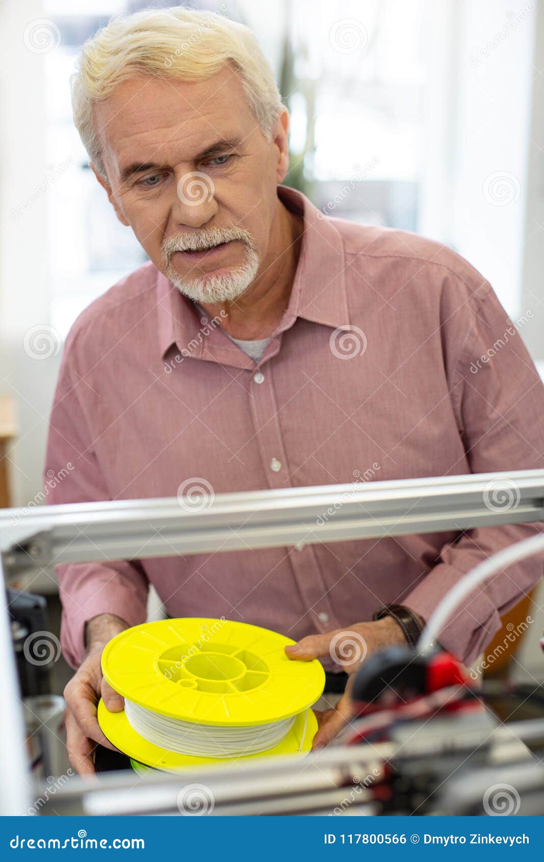 Charming Senior Man Holding Filament for 3D Printer Stock Photo - Image ...